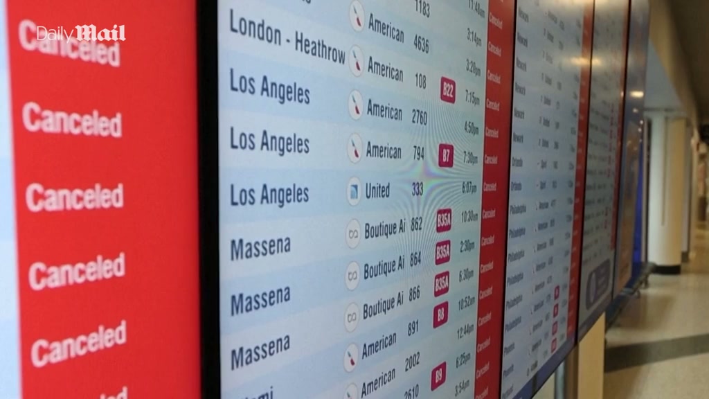 Flights cancelled and cars trapped in snow as storm pummels Boston