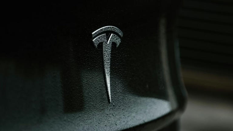 Tesla loses ground to China's BYD after second straight year of sales ...