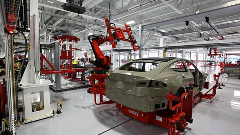 Tesla loses ground to China's BYD after second straight year of sales ...