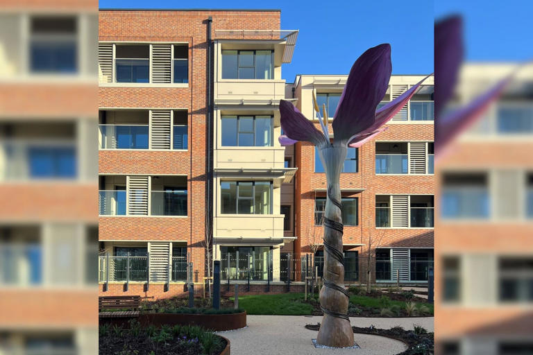Sculpture moved into final position at new senior living village in ...