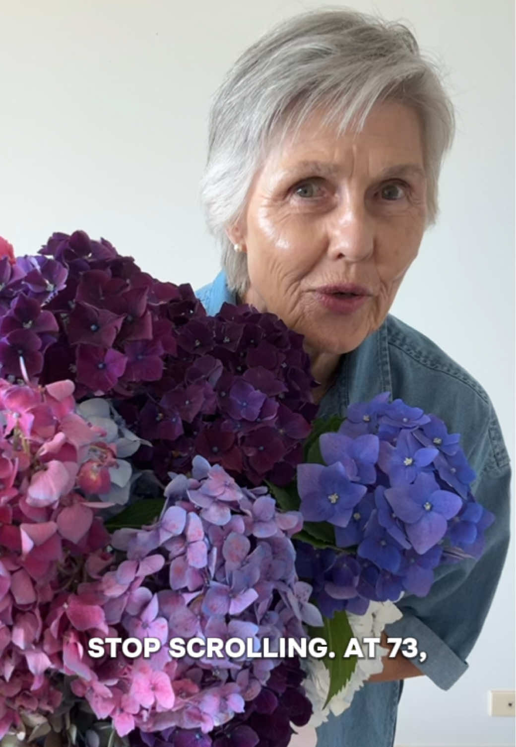 Silver haired beauty at 73, new name same confidence