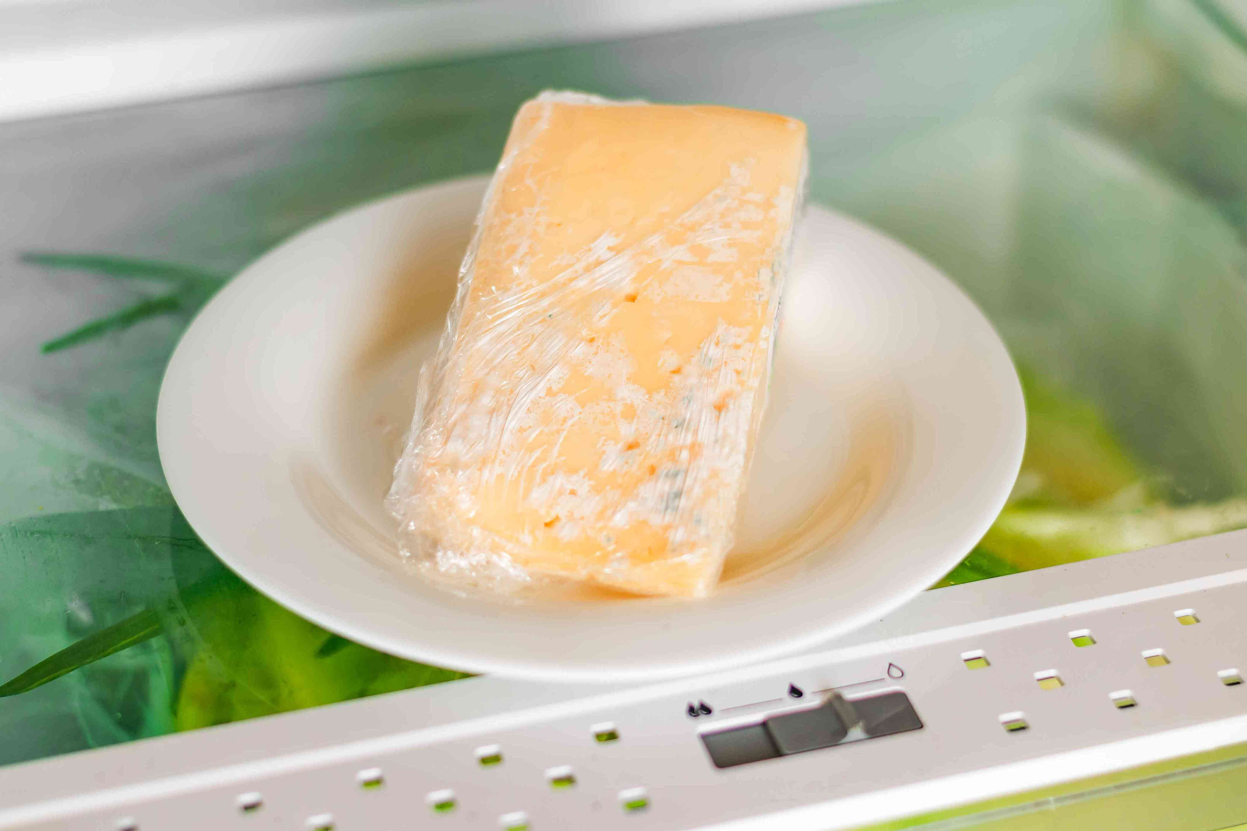 Should you throw away moldy cheese? Here’s what the experts say