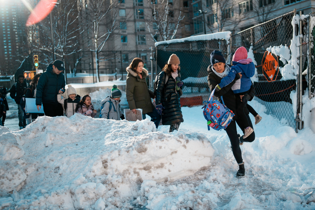 The latest: Northeast US digs out from brutal snowfall as second storm ...