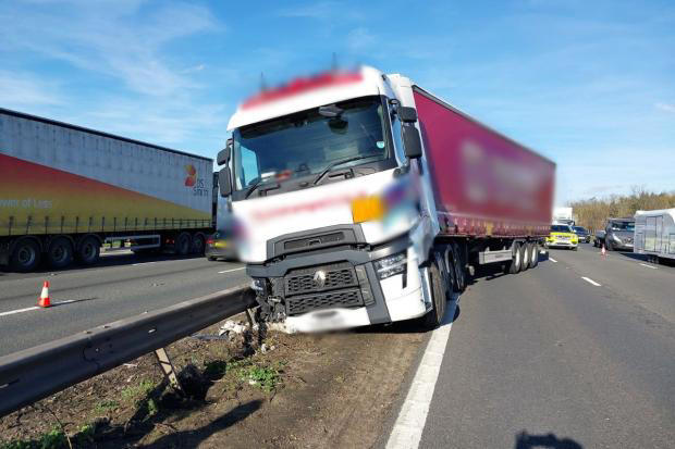 Pictures show lorry hit central reservation after major Essex crash