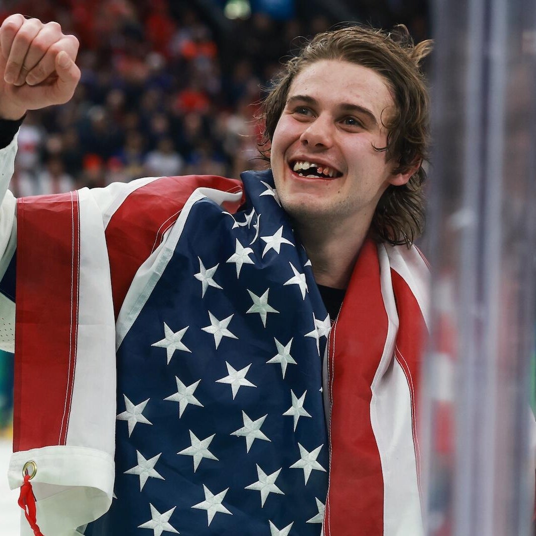 Photographer on capturing Jack Hughes' toothless grin after Olympic gold