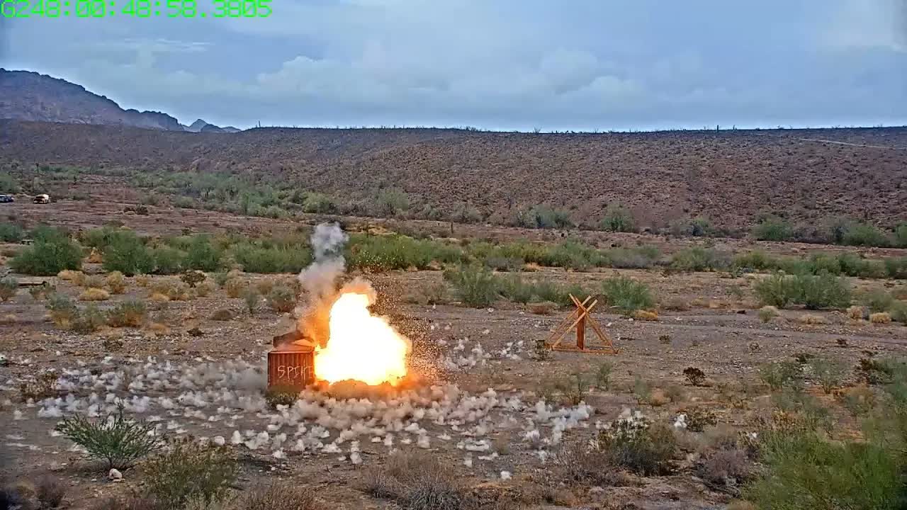 Footage of an Apache helicopter destroying targets