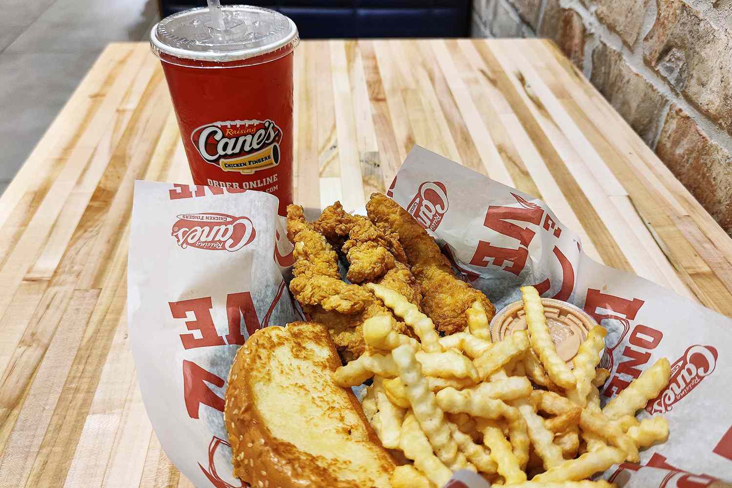 Raising Cane's alleges it is facing eviction because it 'smells like ...