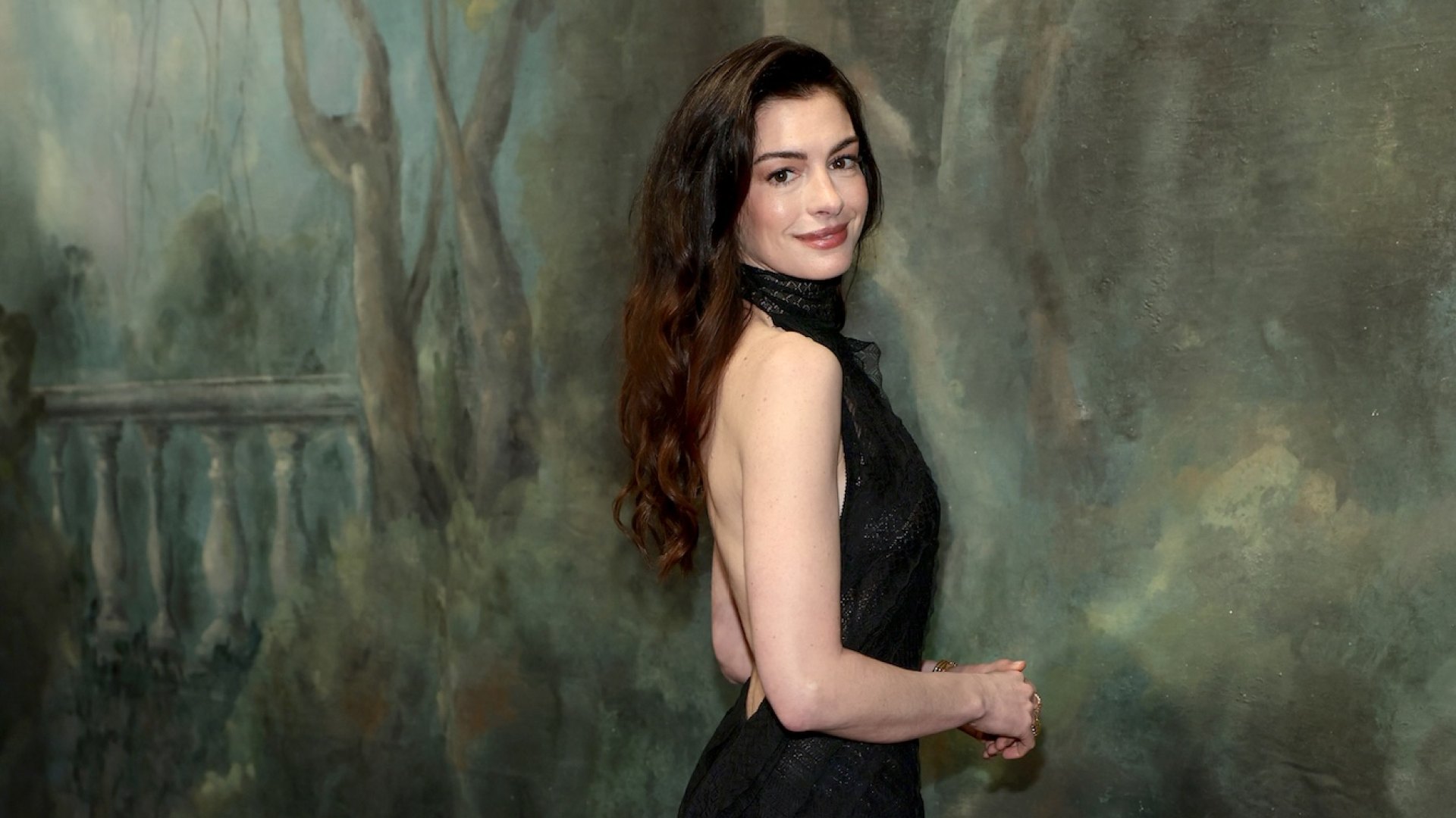Anne Hathaway is ageless in a semi-sheer dress at Ralph Lauren fashion show