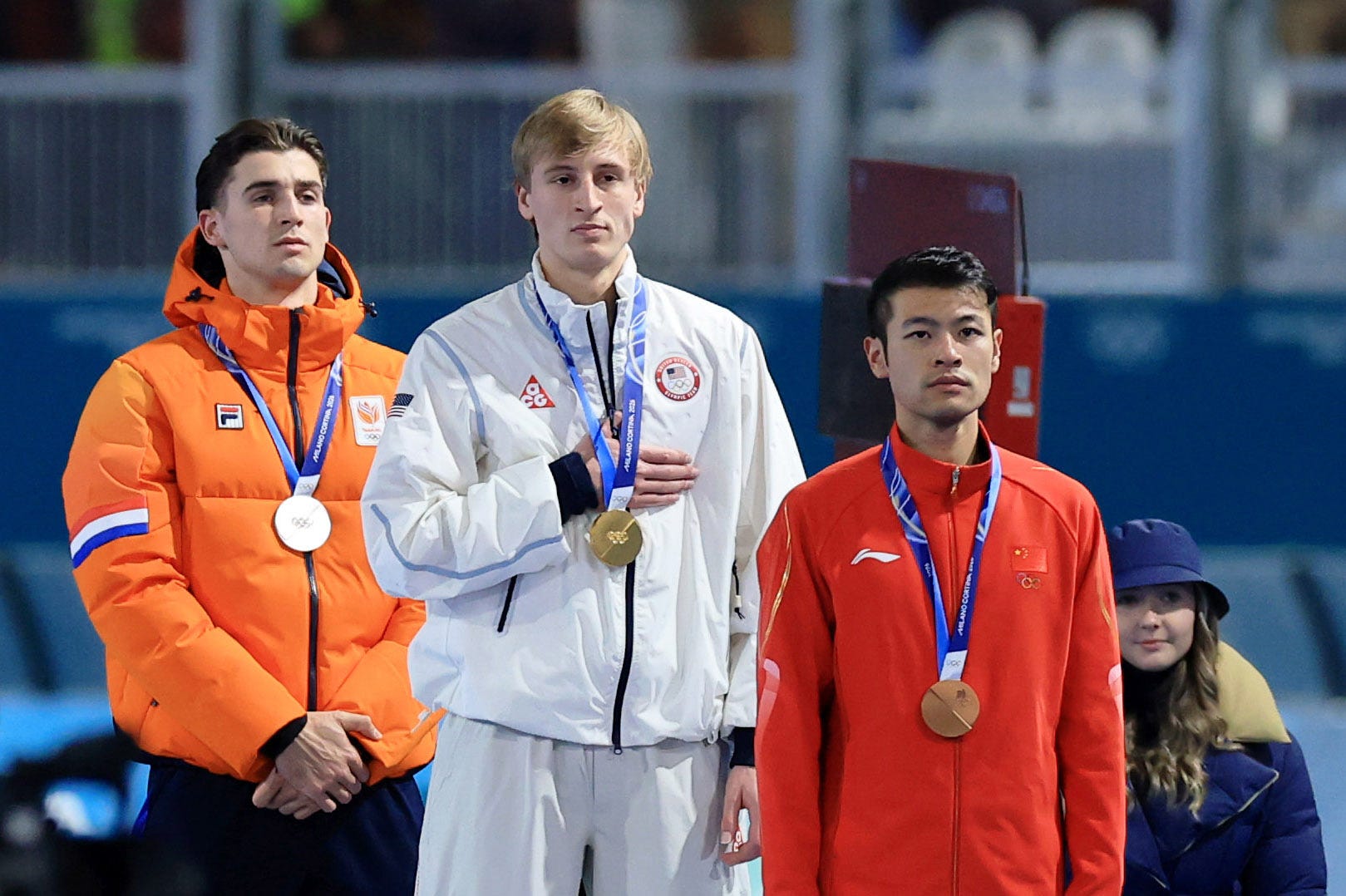 Watch Jordan Stolz get his first Olympic gold medal at ceremony