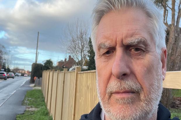 Man told to take down fence he claims makes everyone safer after ...