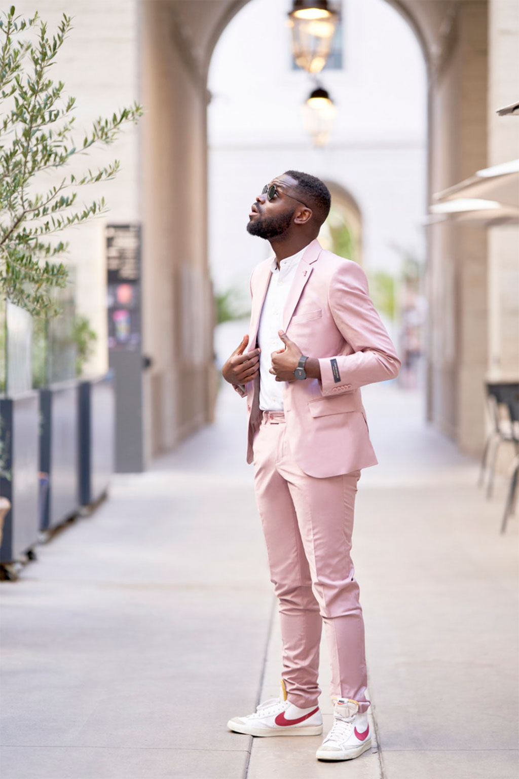 Pink to make the guests wink: Check out these slick grooms in pink suits
