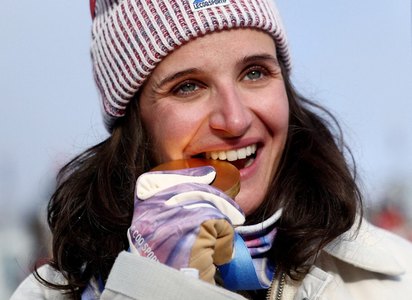 Convicted French biathlete wins two Olympic golds
