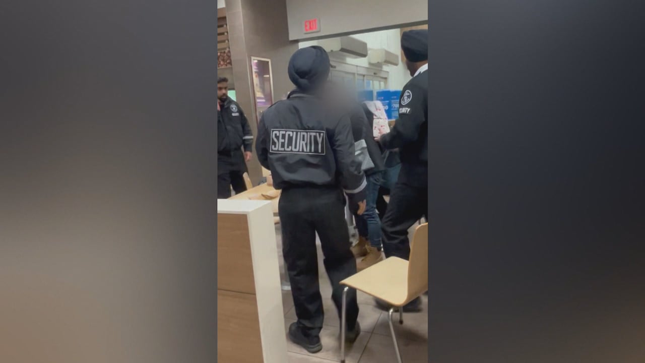 Raw video shows Walmart security guard and woman strike each other in ...