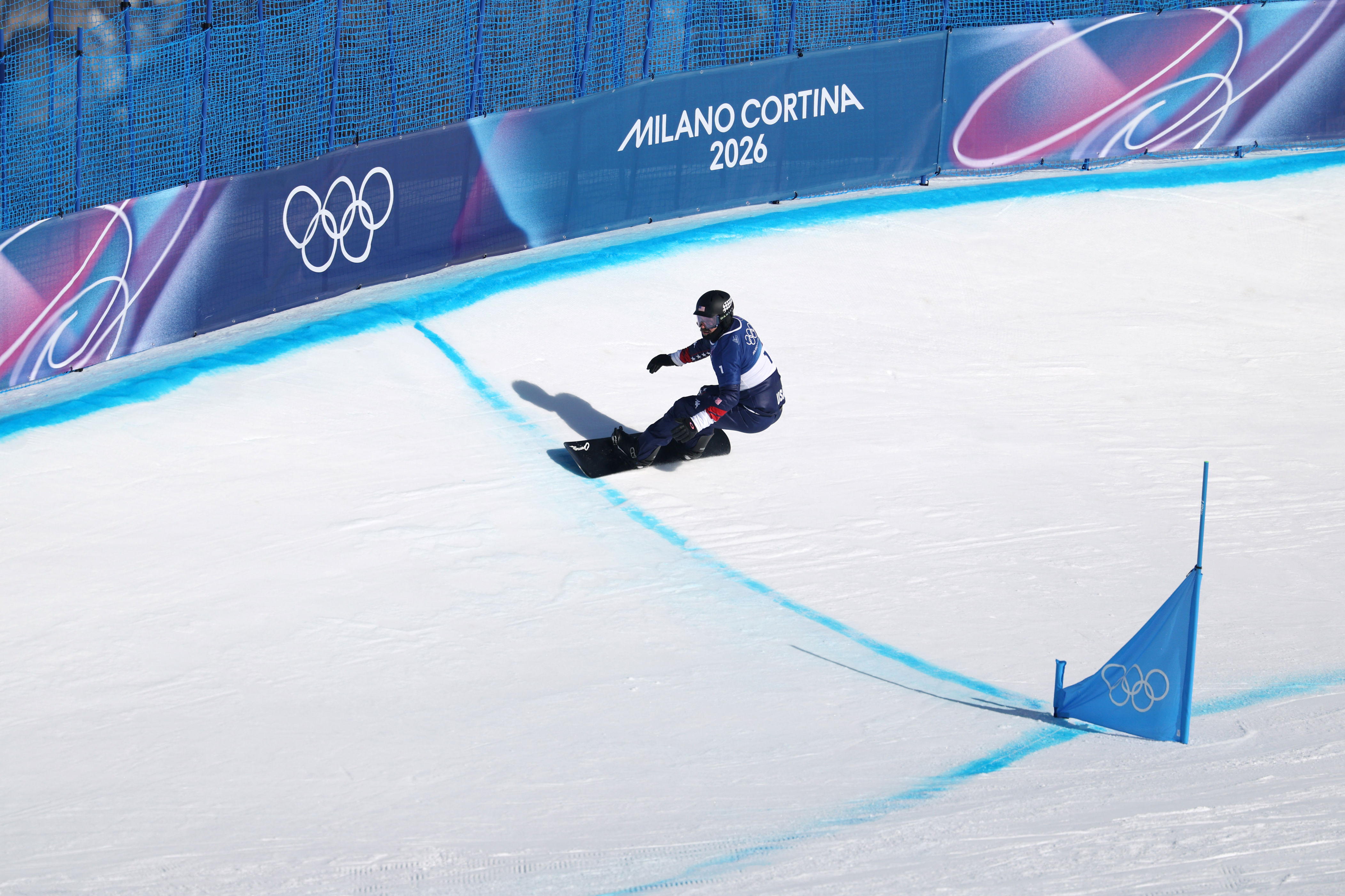 Watch: Michigan snowboarder, Team USA's oldest competing athlete, races ...