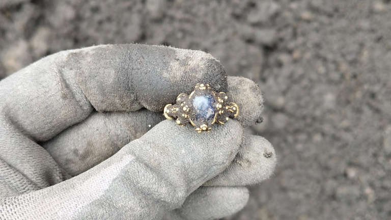 Medieval gold ring with dazzling blue gemstone discovered in Norway is ...