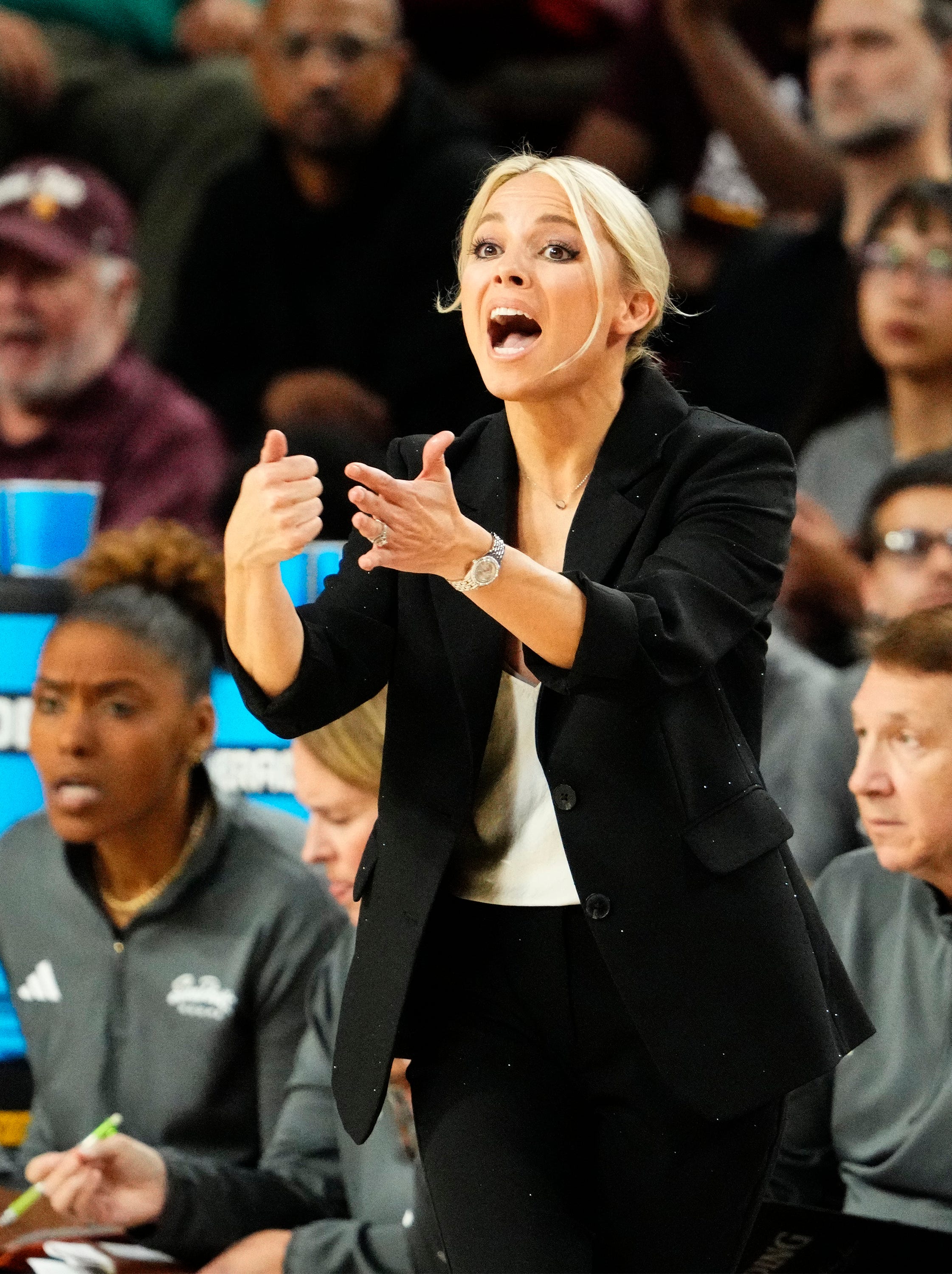 ASU head coach Molly Miller not with the team at NCAA tournament
