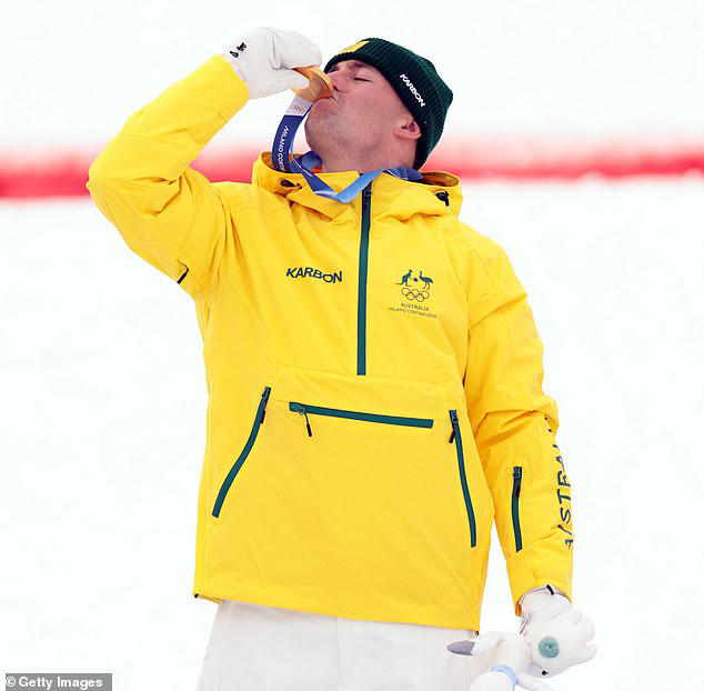 Australian Cooper Woods stuns the world to win gold in men's moguls at ...