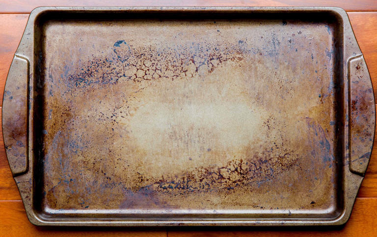 This simple trick makes stubborn baking sheets so much easier to clean