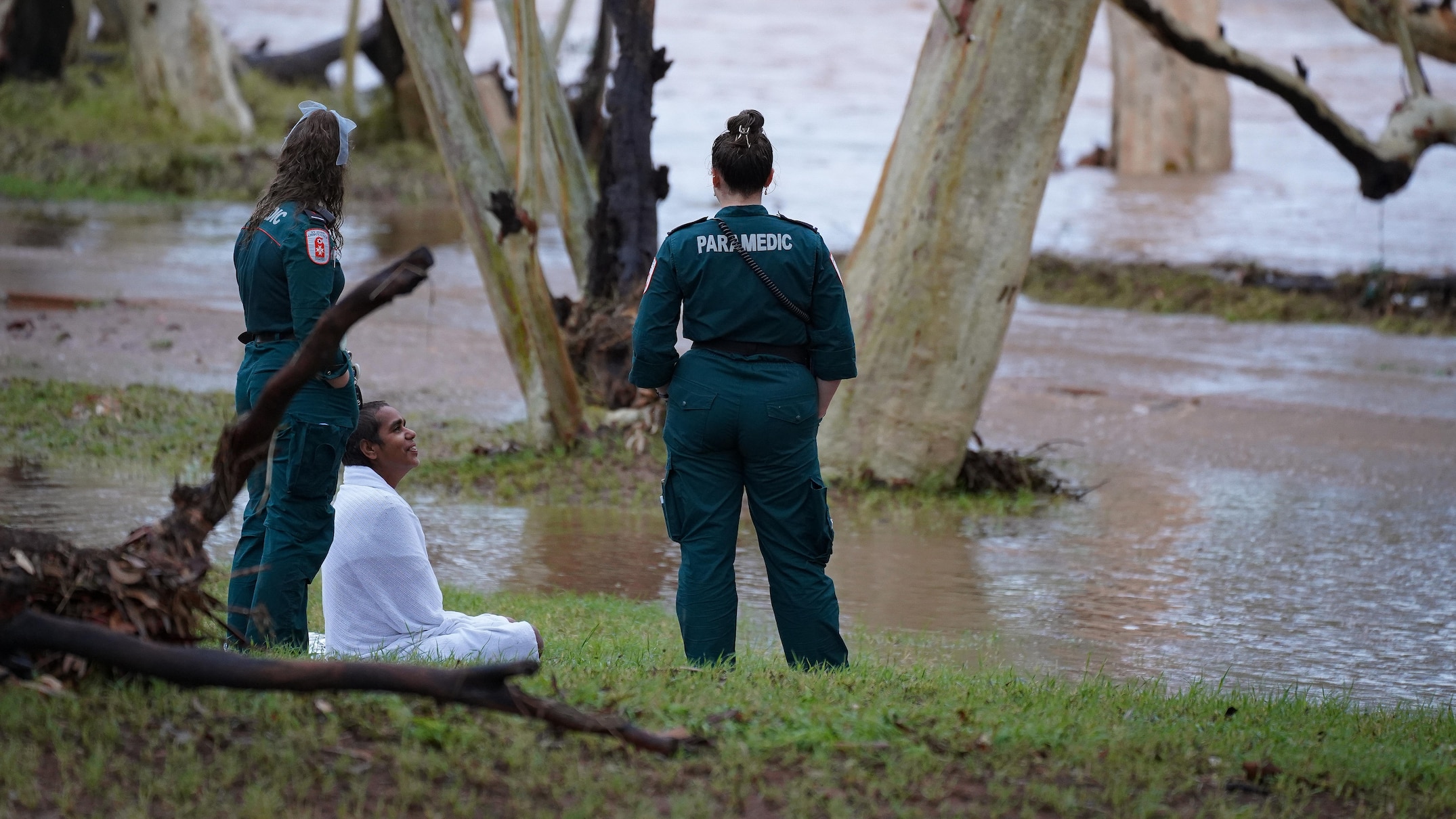 Alice Springs woman survives 12-hour flood ordeal on Todd River