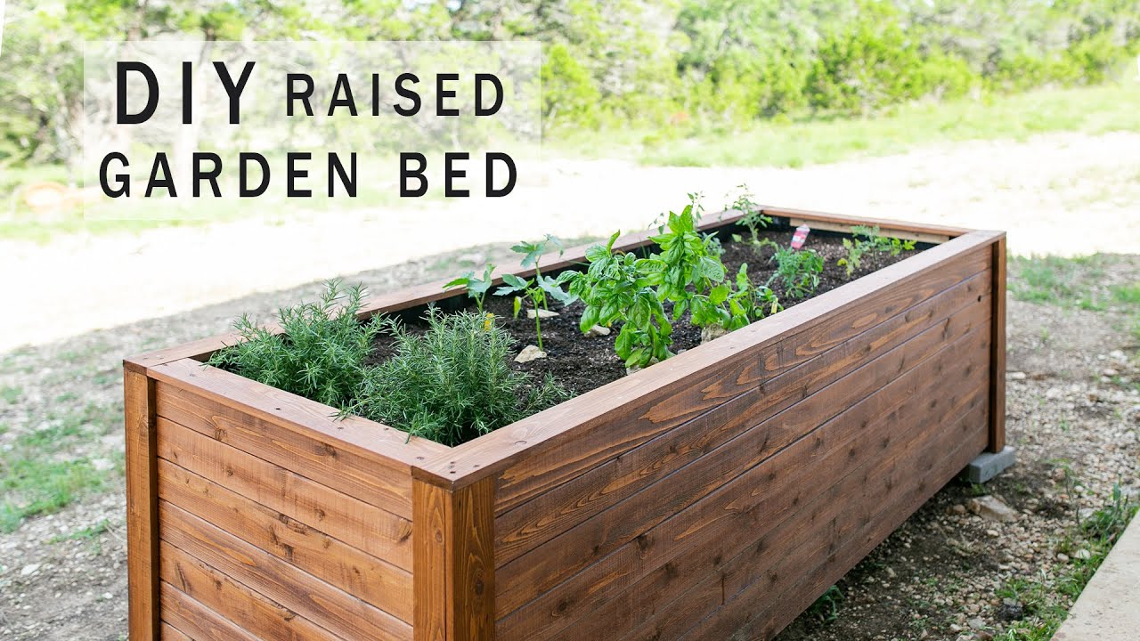 Build a DIY raised garden bed with hidden storage drawers