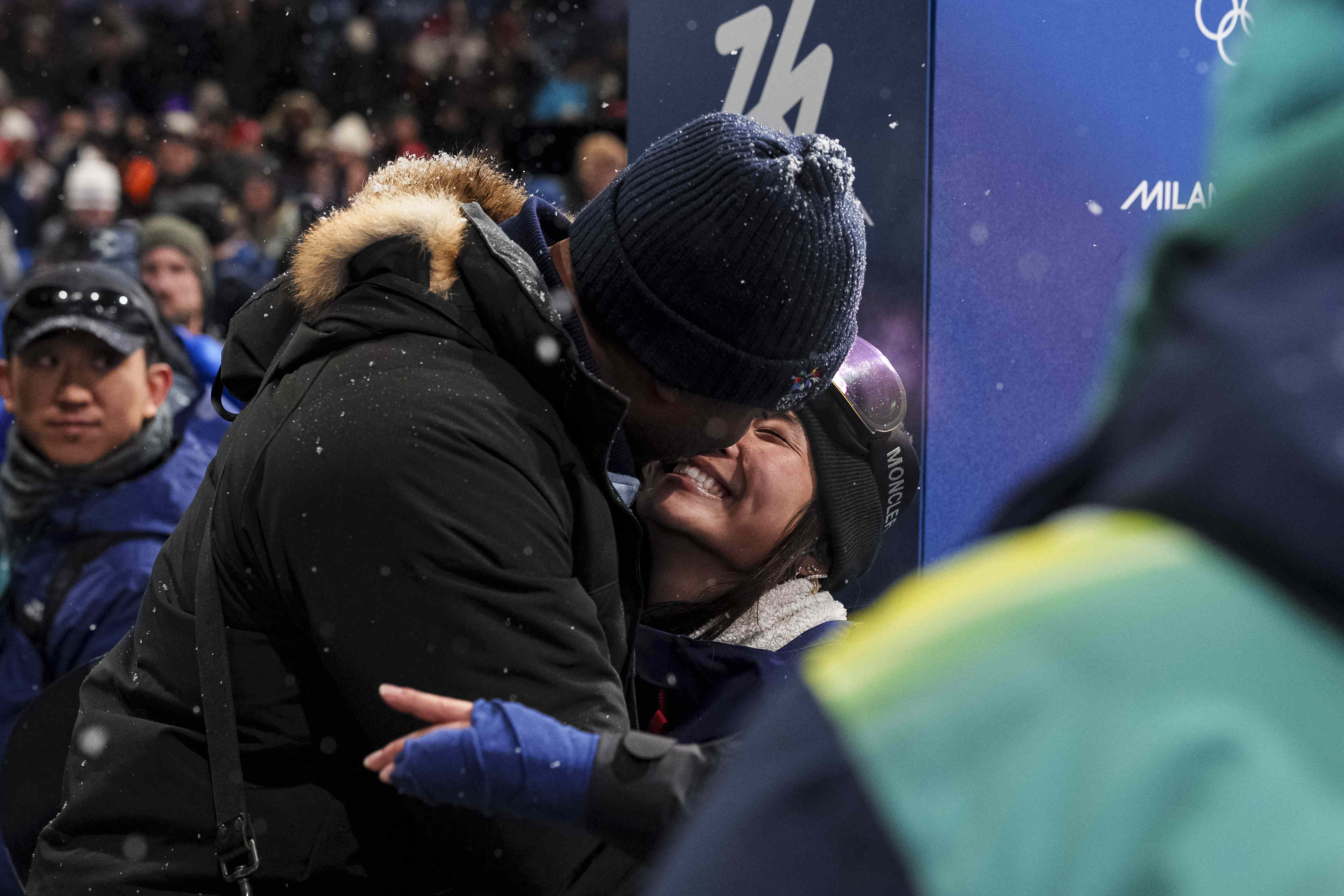 Chloe Kim and Myles Garrett seal her silver medal win with a kiss at ...