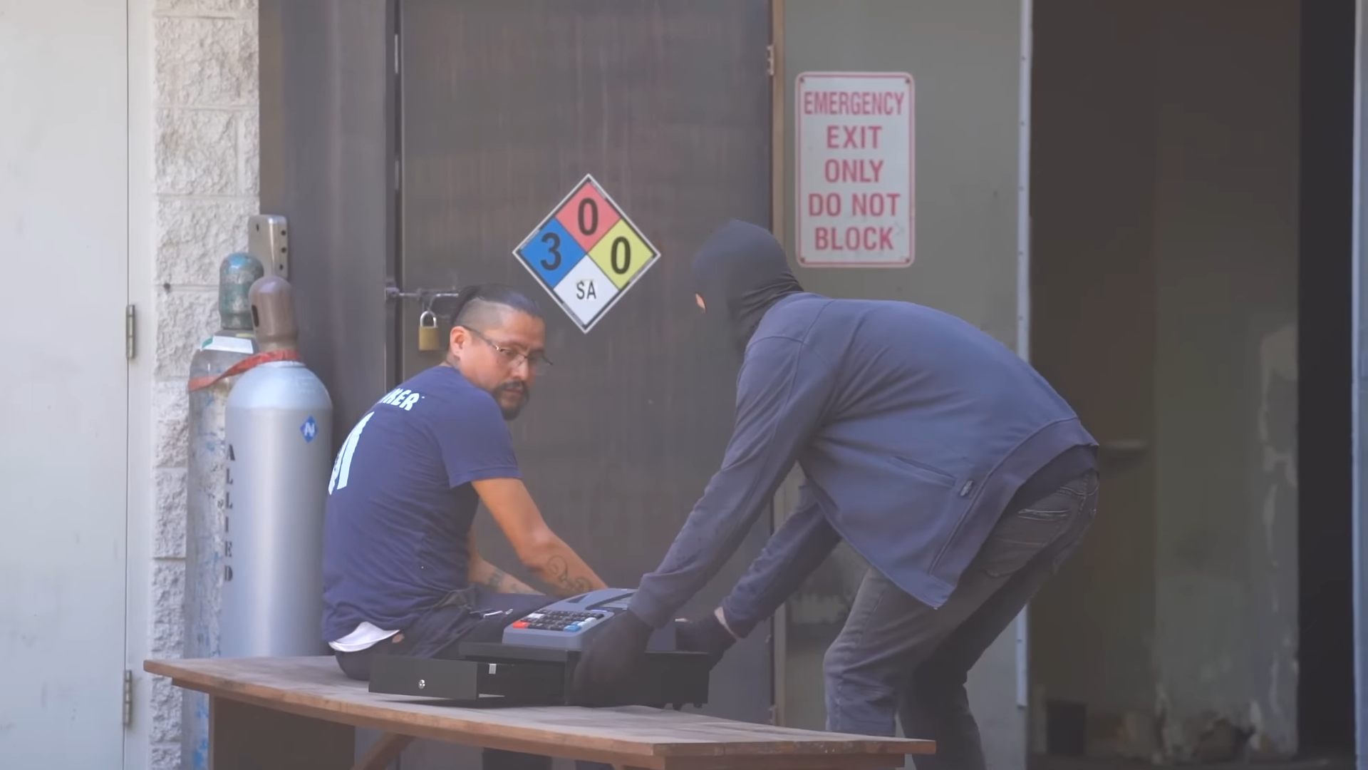 Polite robber gives away a register full of cash - they freak out