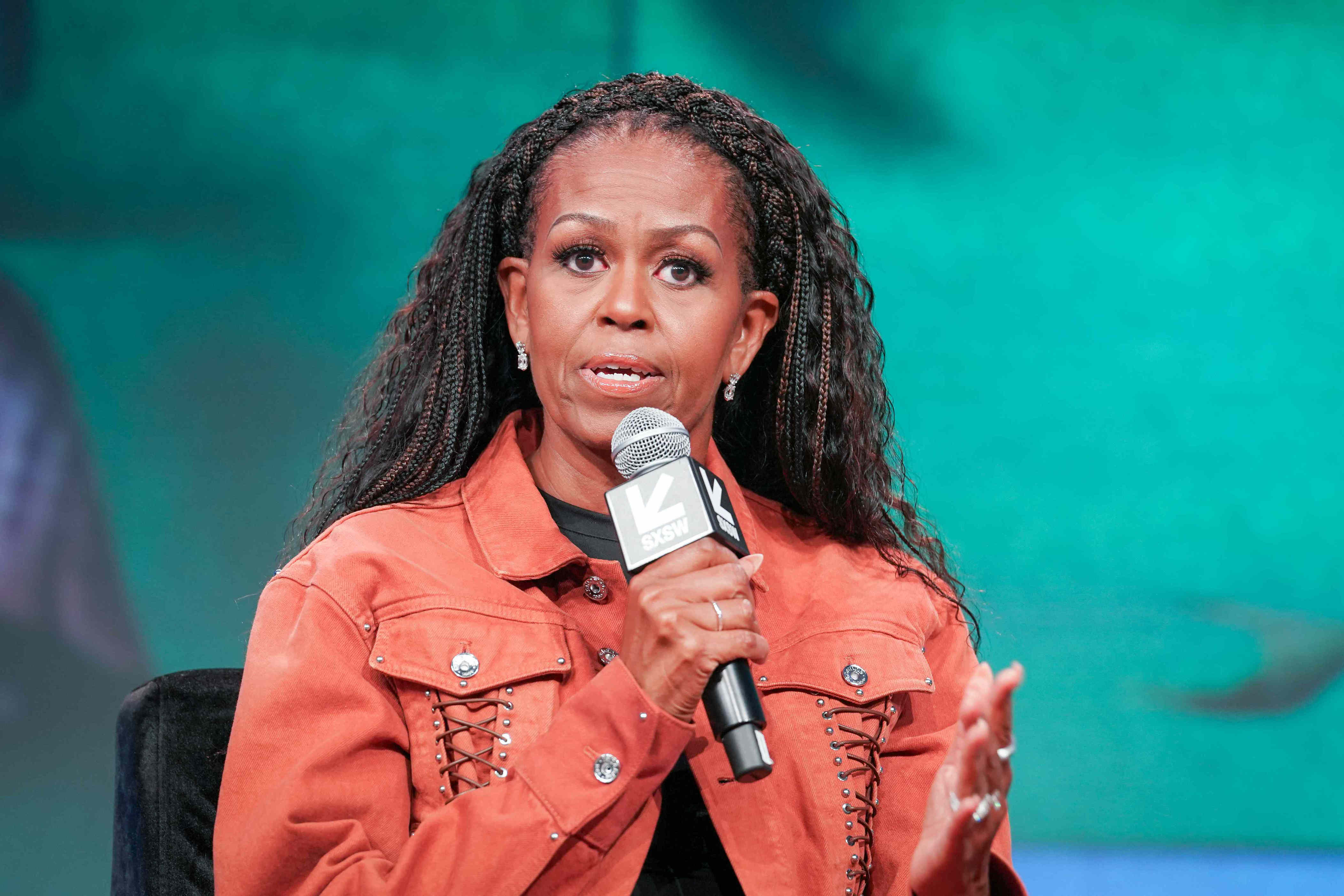 Michelle Obama opens up about recently getting 10 new body piercings at ...