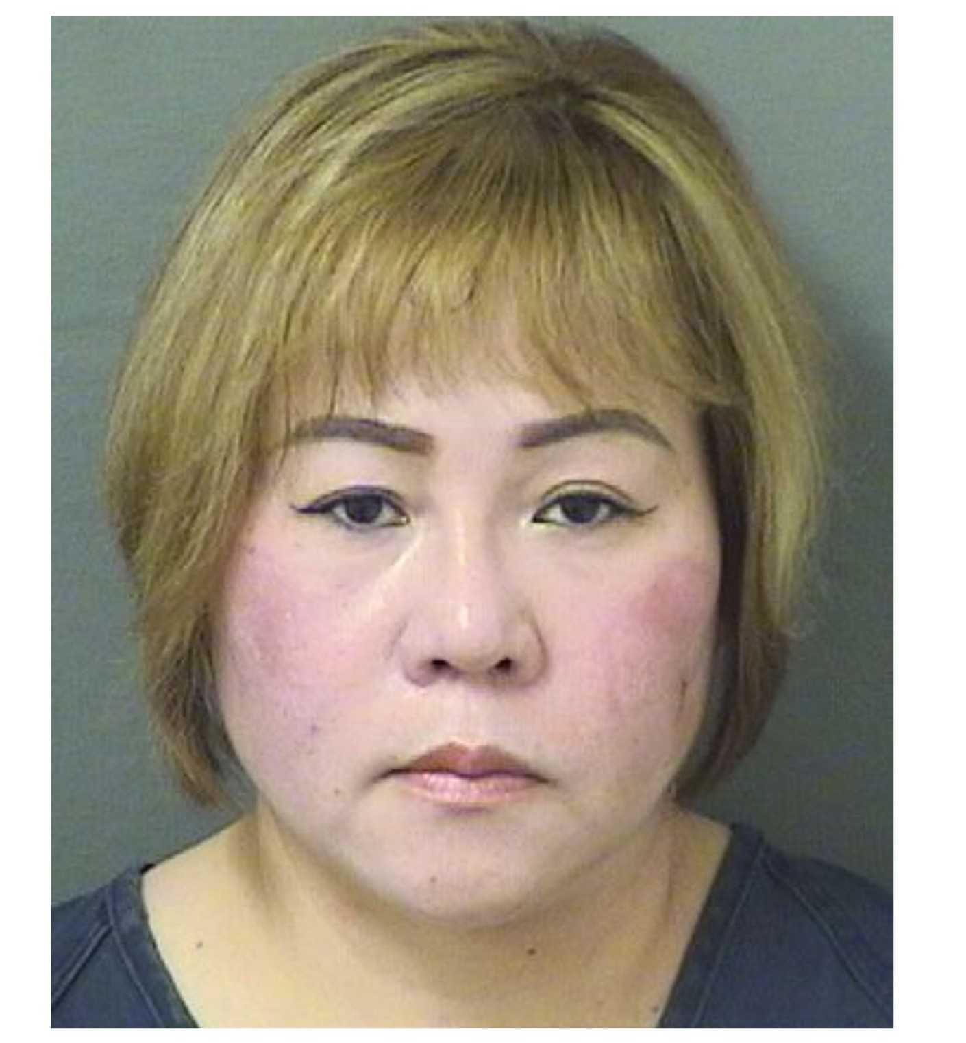 Boynton Beach woman accused of using knife to force husband into $15K ...