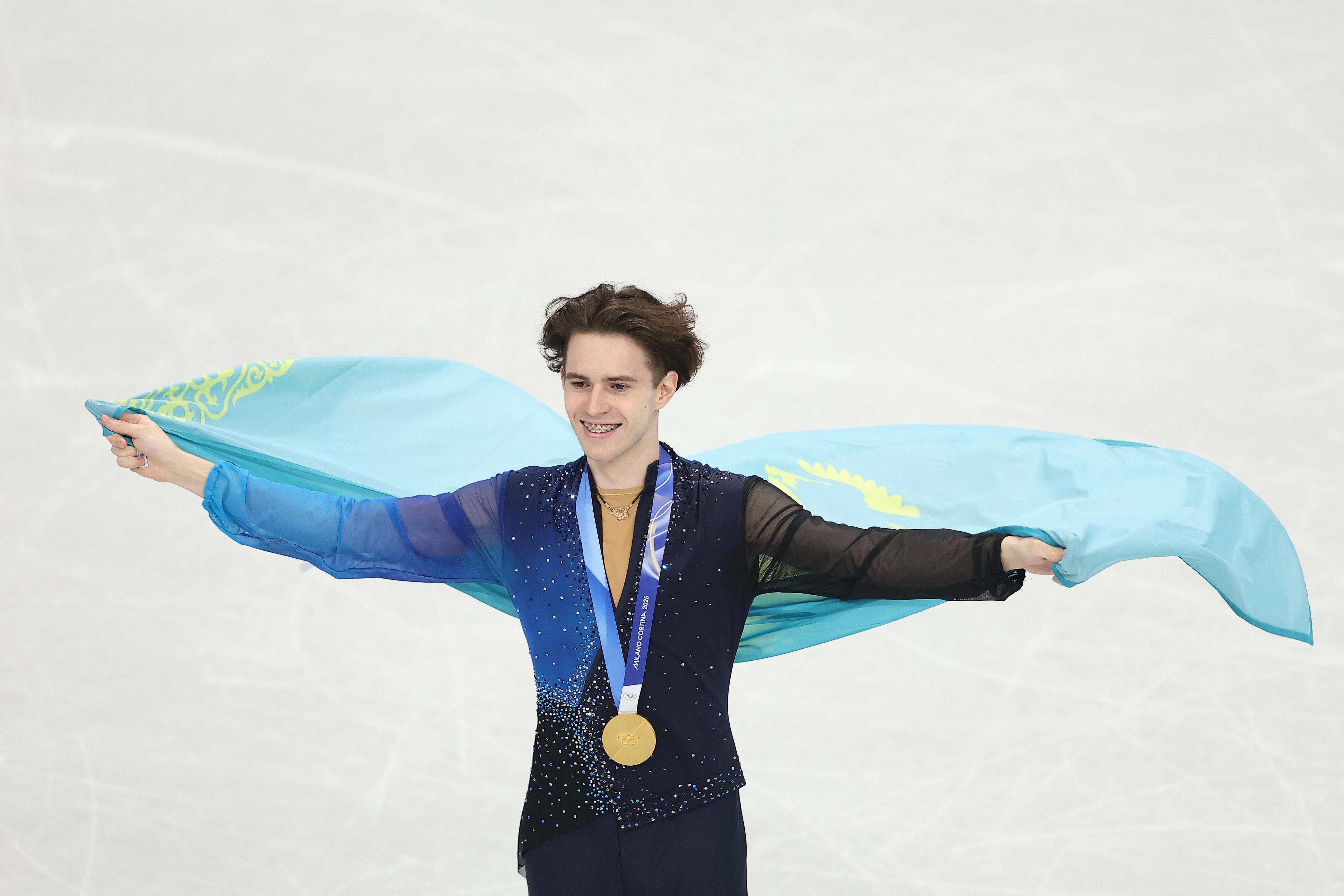 Who is Olympic figure skating gold medalist Mikhail Shaidorov?