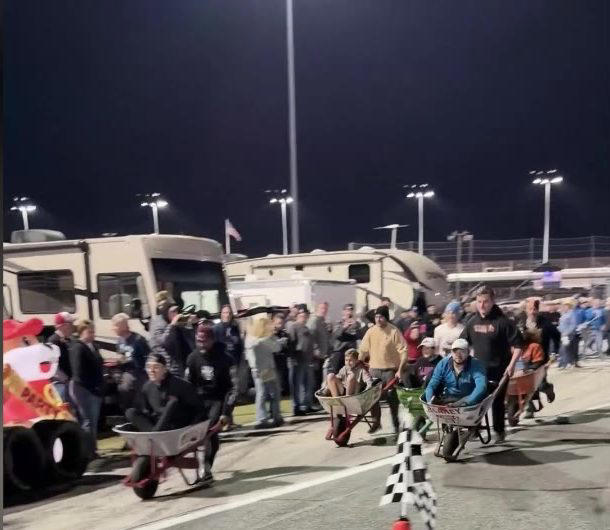 Watch: Wheelbarrow racing tradition continues at Cowboy Corner ahead of ...