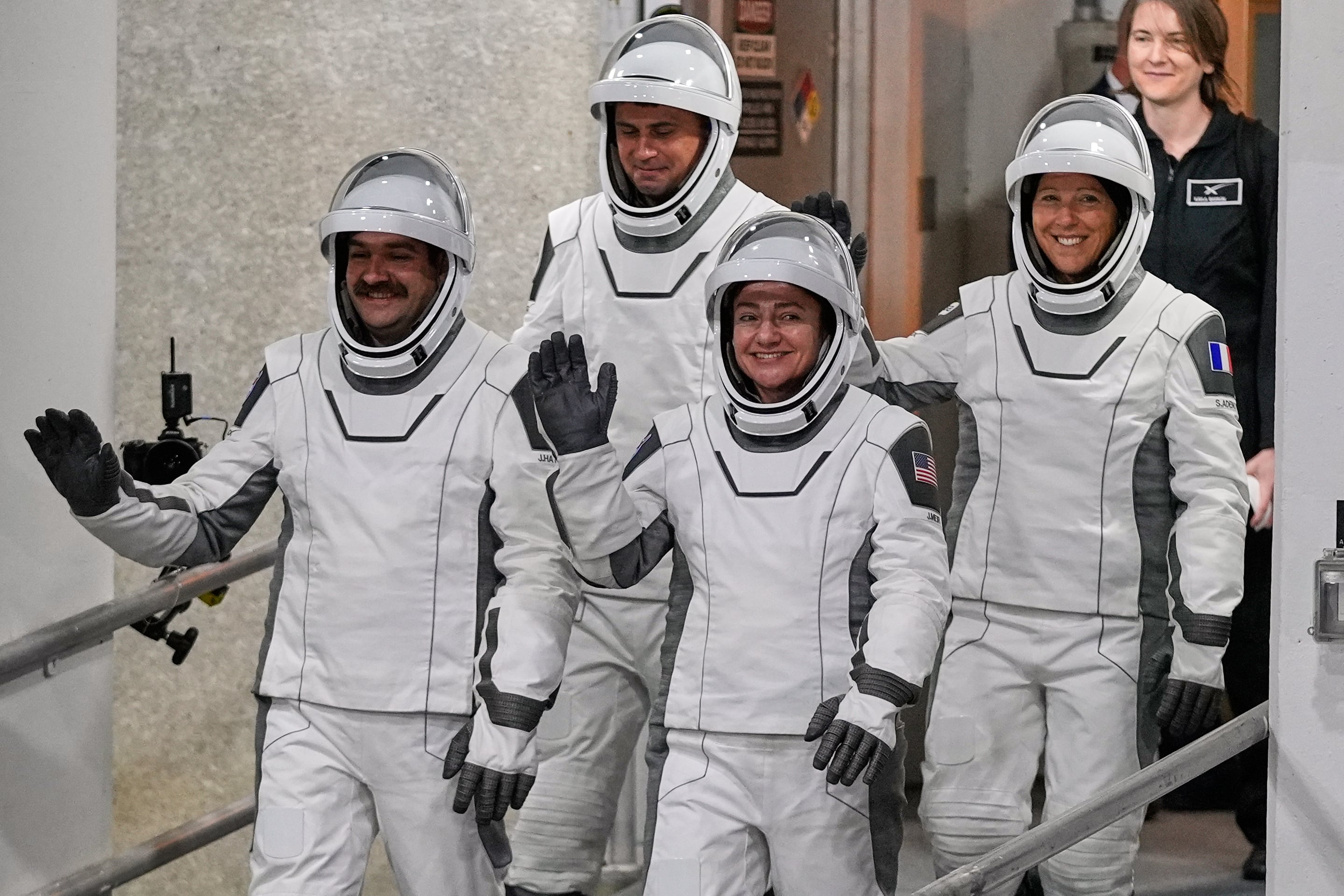 Four new astronauts arrive at the International Space Station to ...