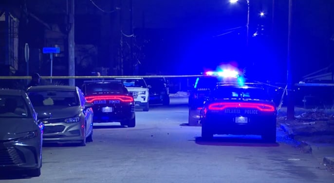 Road blocked off with crime scene tape in NW Atlanta