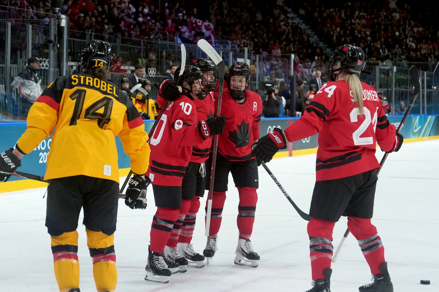 Poulin returns to Canada's lineup after injury, ties Olympic goals record