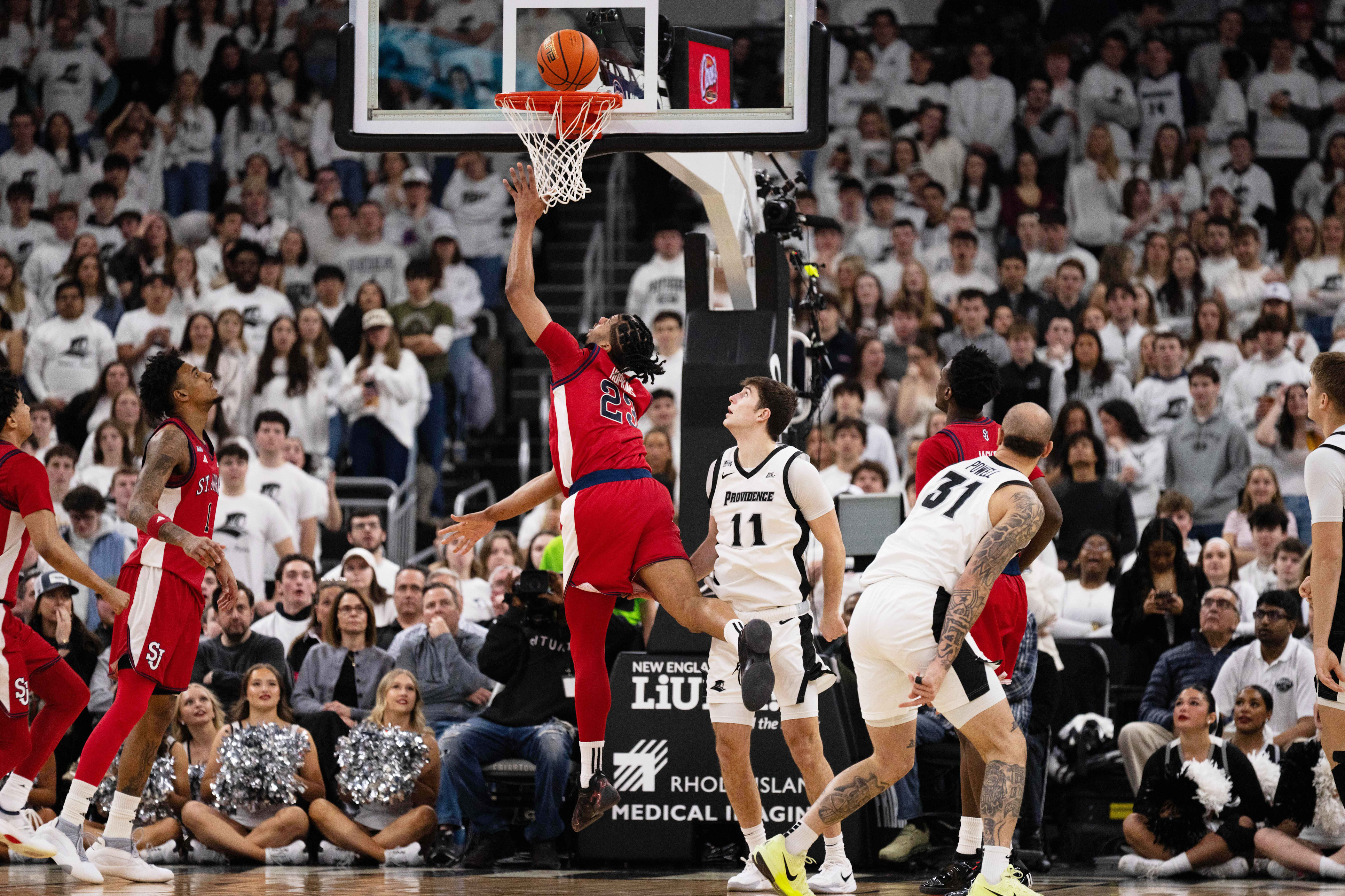 Seven ejected in PC-St. John's game after foul on ex-Friars star Bryce ...