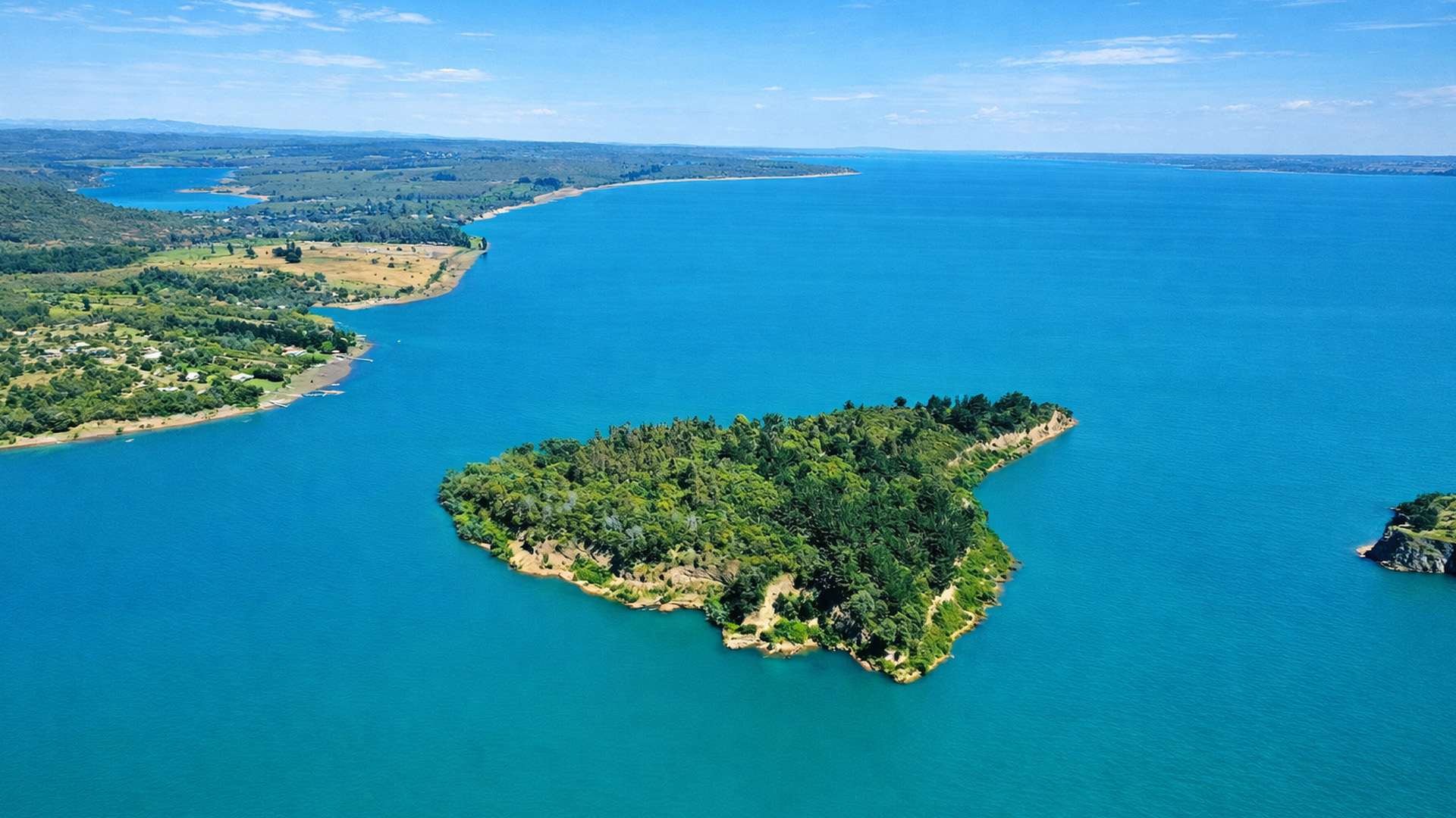 Serene Turquoise Lake In The Heart Of Chile Colbún