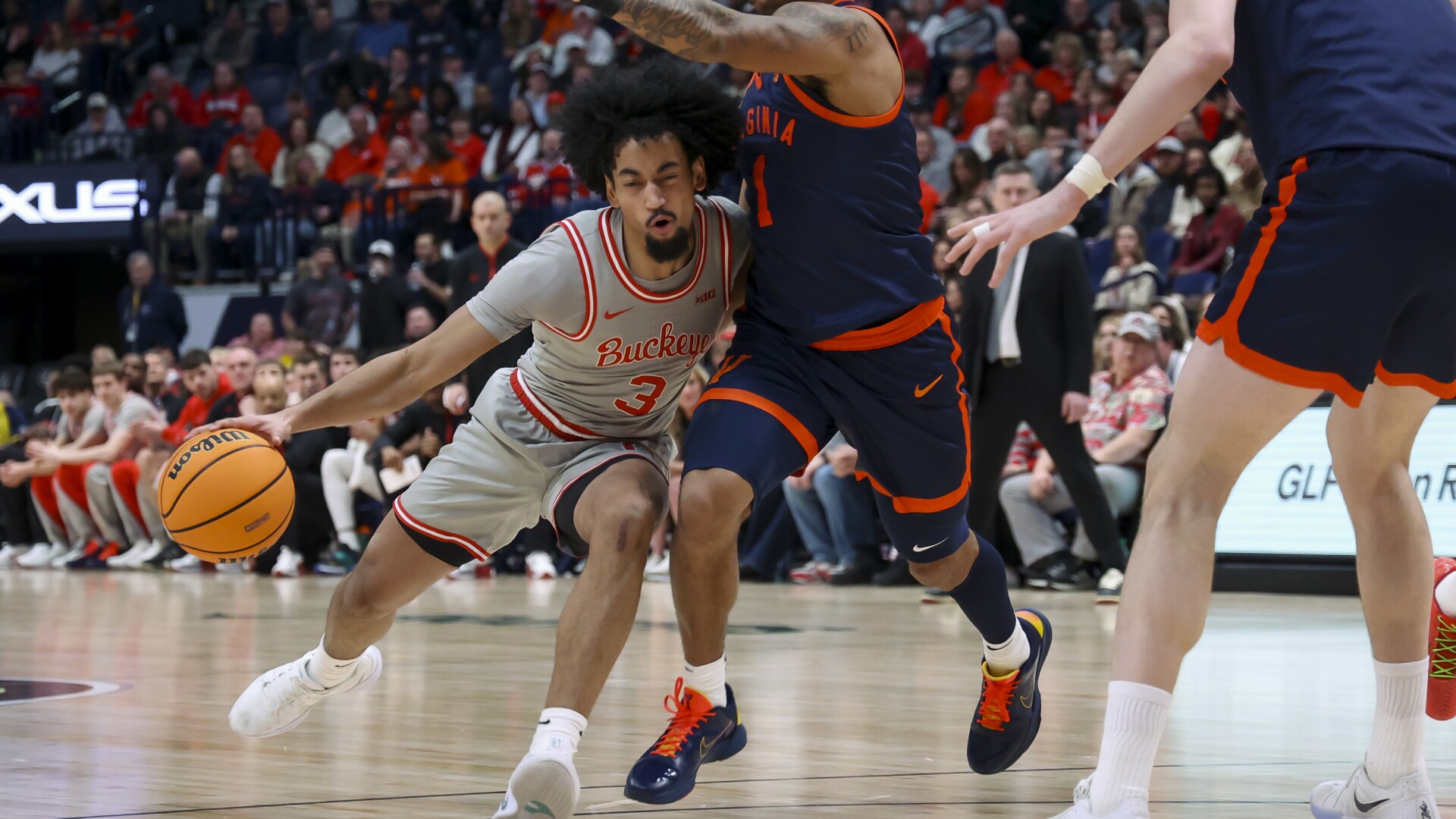 Thomas, Lewis help No. 15 Virginia beat Ohio State 70-66 in Nashville