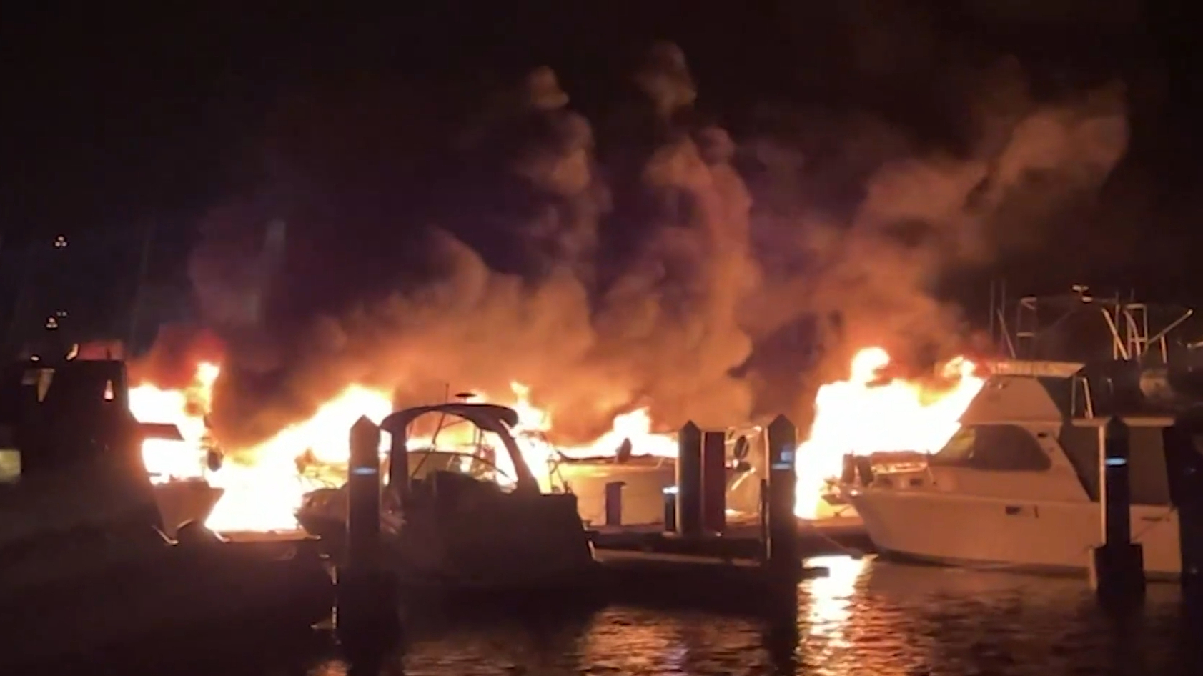 Mystery blast burns boats and forces restaurant to evacuate