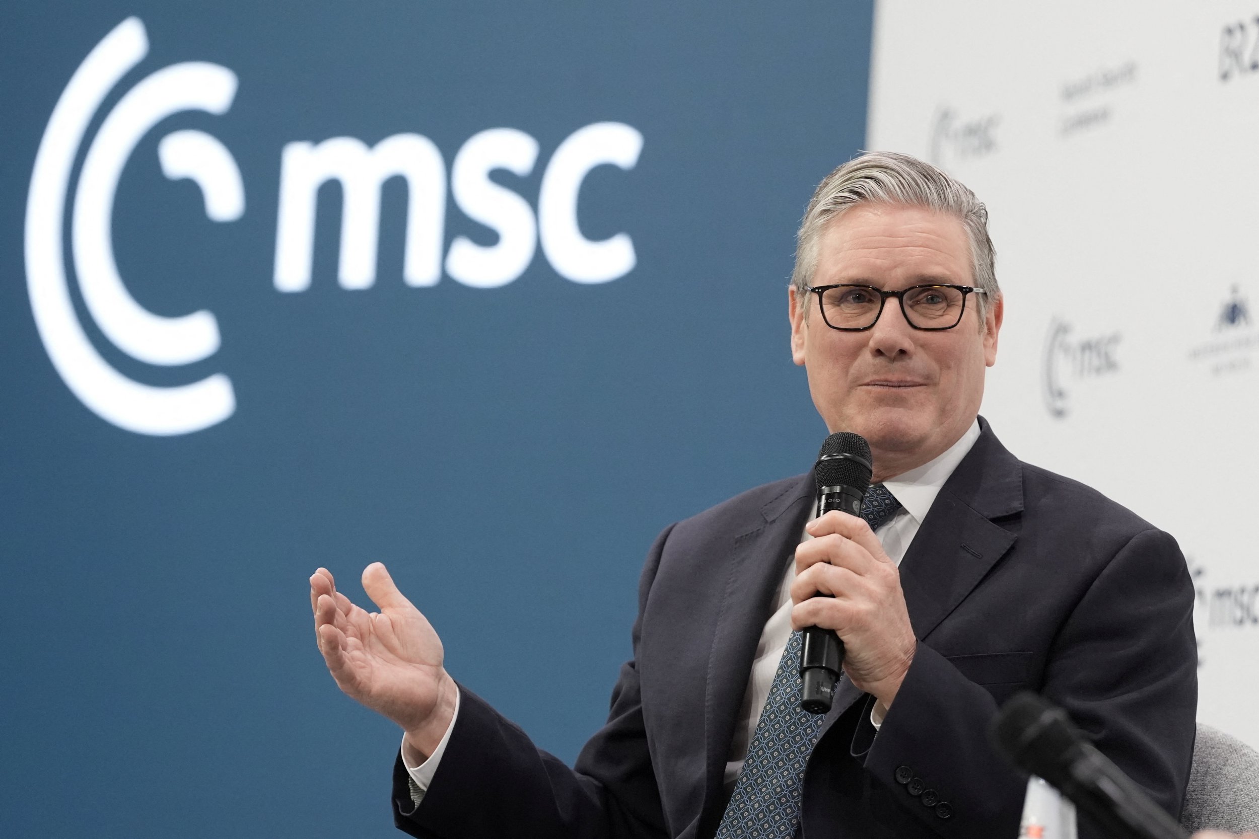 Keir Starmer warns the UK 'must step up and go faster' on defence spending