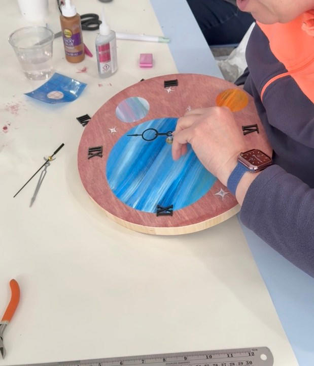 Grand Rapids art studio hosts clock-decorating workshop
