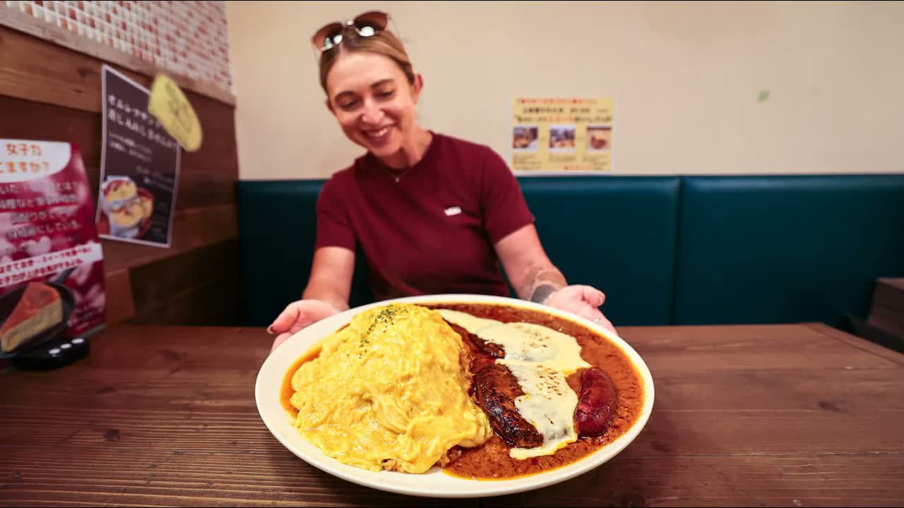 Woman tries to survive this giant curry food challenge in Japan