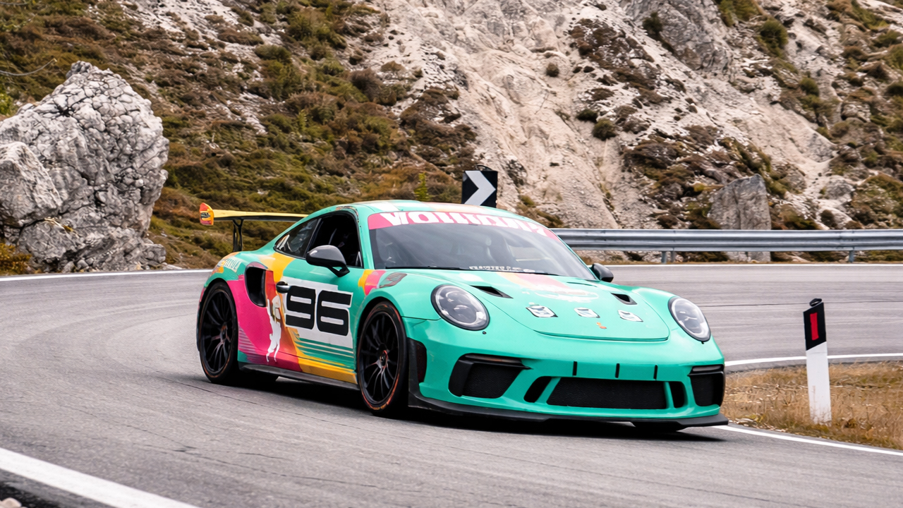 Porsche GT3 RS drifting through mountain roads