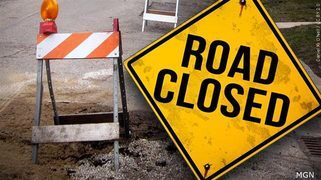 Road closed after car crashes into pole in Simsbury