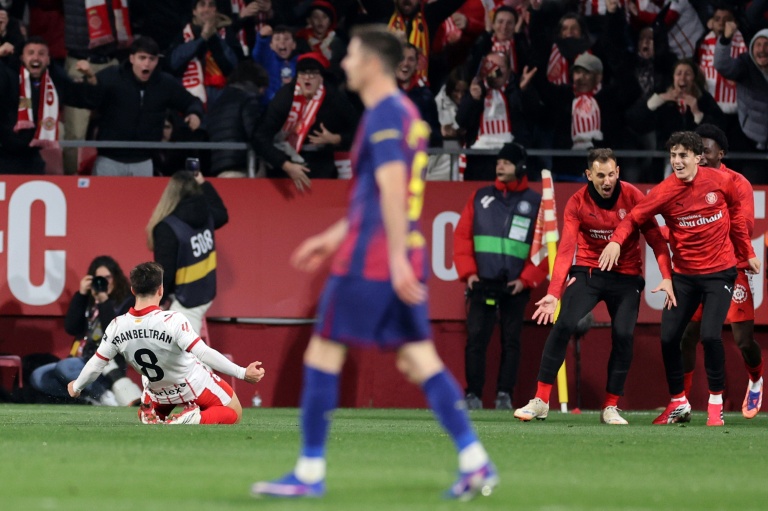 Barca suffer title defence blow in Girona derby defeat