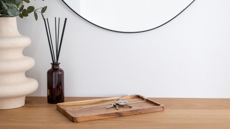 Craft an entryway key holder using a Dollar Tree staple
