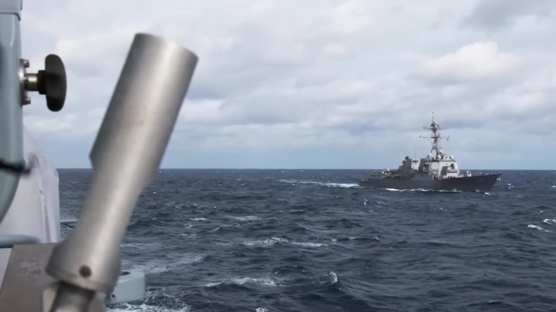 Venezuelan coast guard vessel approaches destroyer