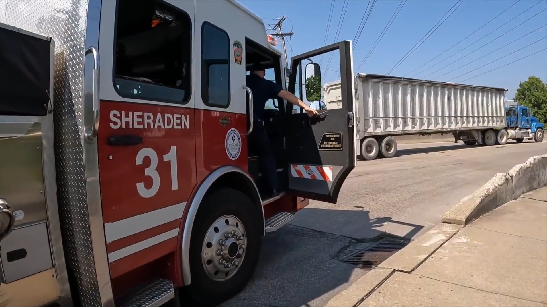 Firefighters stopped to watch… then started pulling metal with us