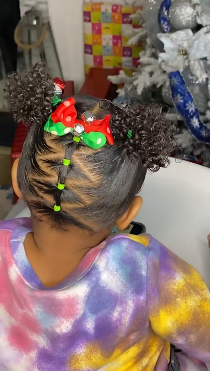 Adorable kid braiding hair like a pro