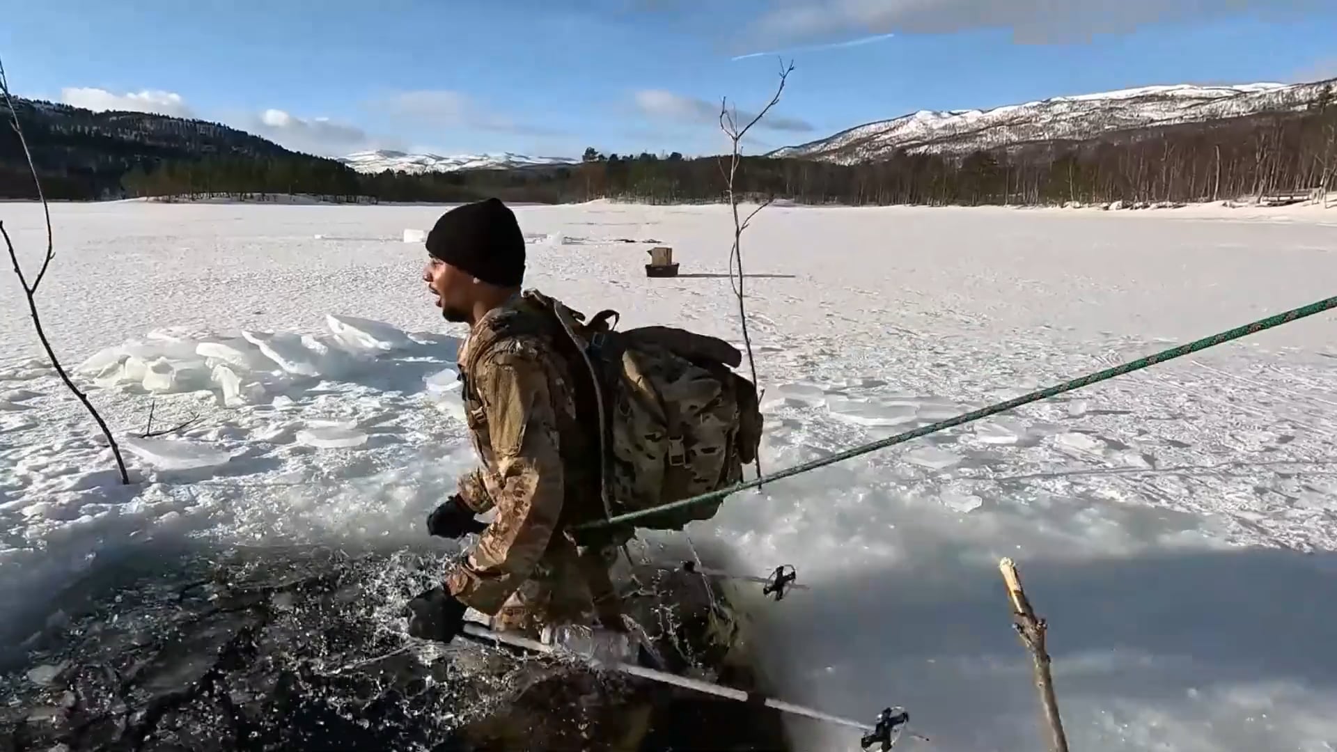 Soldiers dive into frozen lake and survive the Arctic