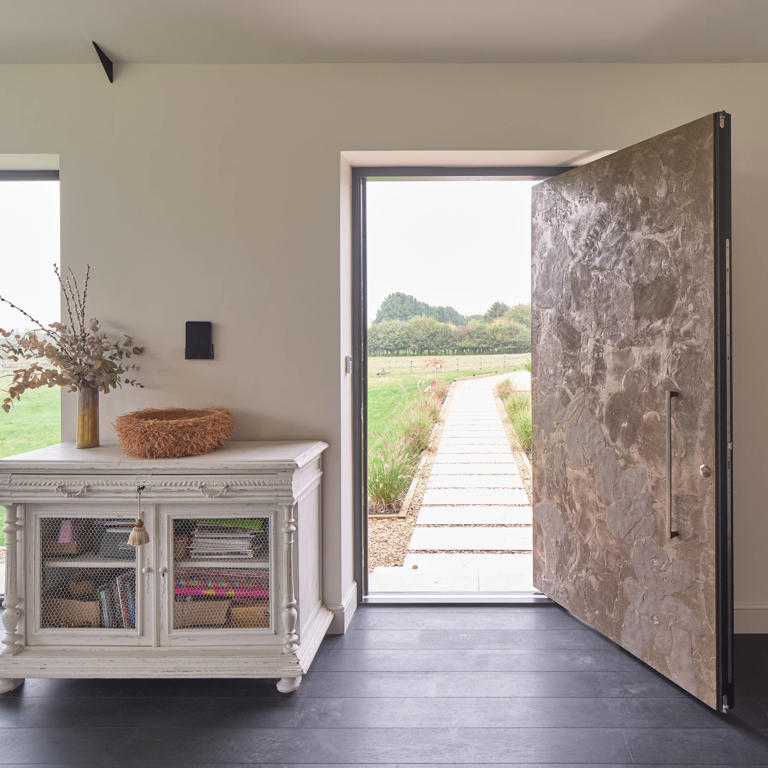 A pivot door could be a stylish addition to your home and elevate its ...