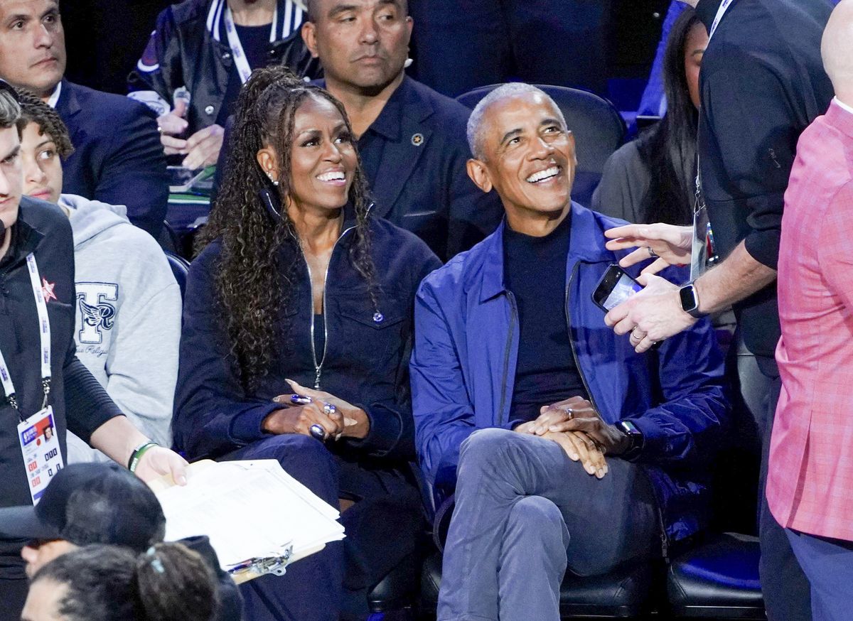 Michelle Obama wears burgundy figure-hugging bodycon with statement ...